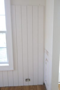DIY Vertical Shiplap Half Wall with Real Shiplap - Angela Marie Made