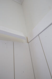 DIY Vertical Shiplap Half Wall with Real Shiplap - Angela Marie Made