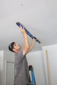 DIY Garage Ceiling Storage and Wall Organization - Angela Marie Made