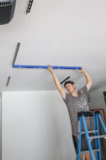 DIY Garage Ceiling Storage and Wall Organization - Angela Marie Made