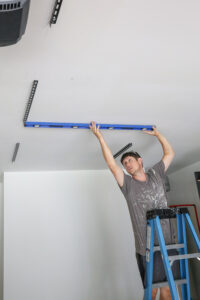 DIY Garage Ceiling Storage and Wall Organization - Angela Marie Made