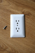 The Easiest Way to Update and Hide a Wall Outlet - Angela Marie Made